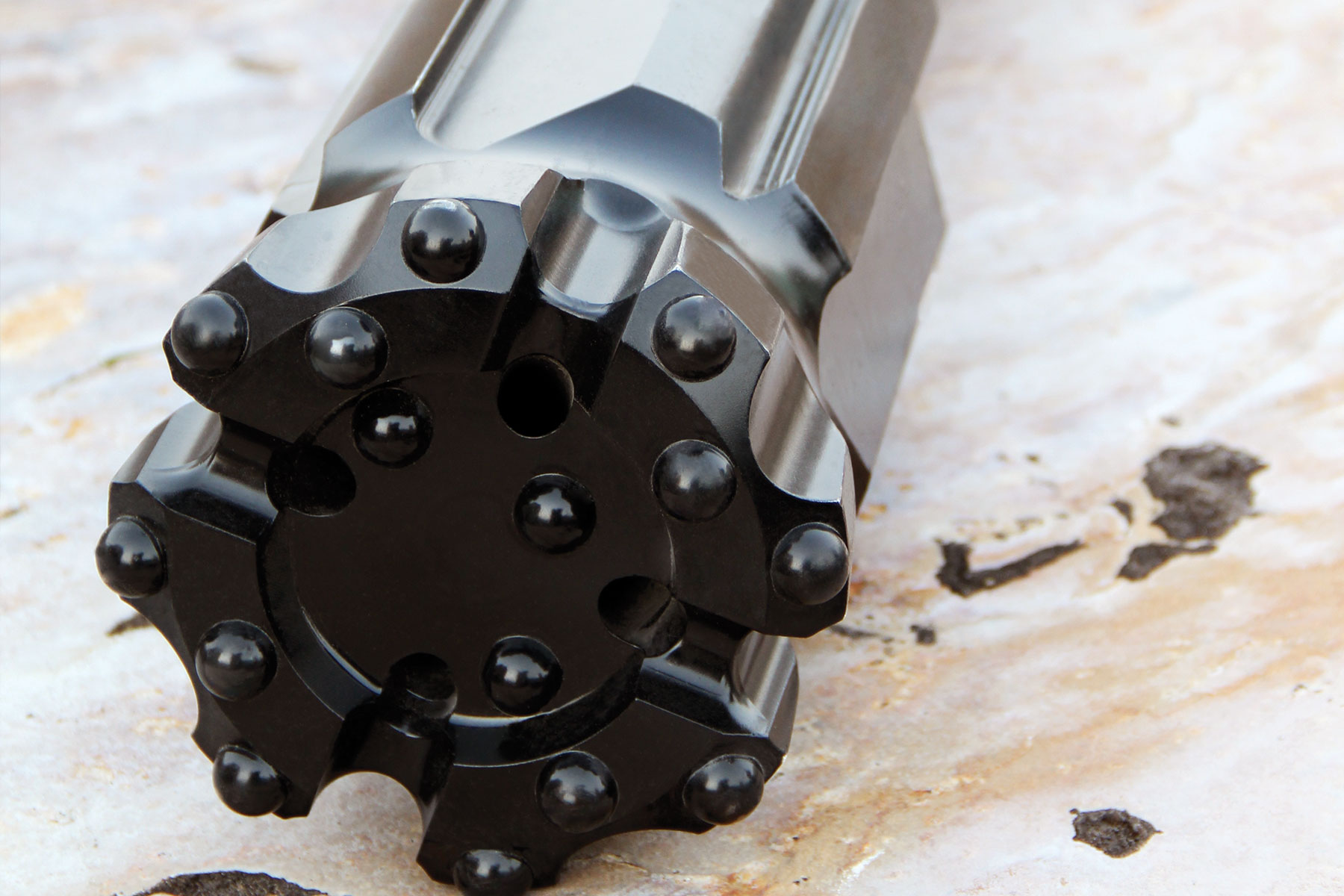 Bits, shanks and accessories for top hammer tooling by Boart Longyear